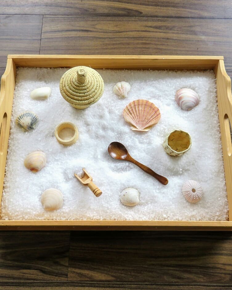 Mindful play with rock salt, shells and treasures