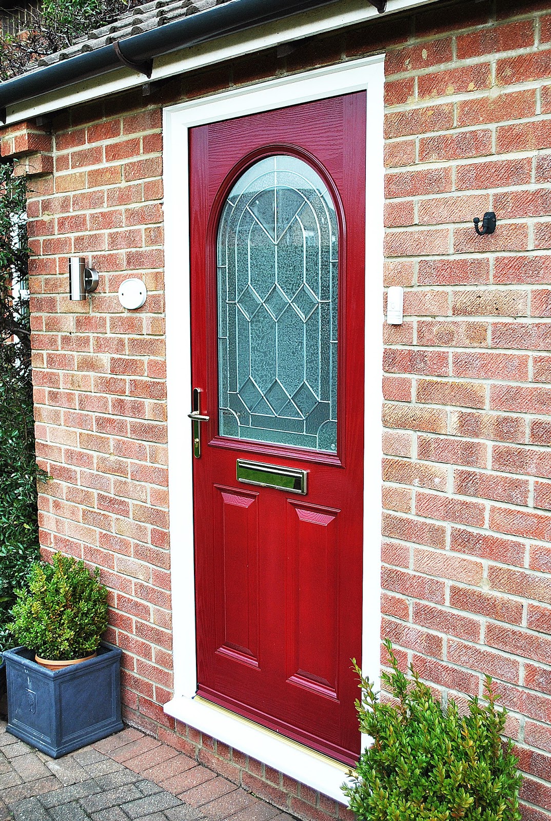 A Bold Statement - Red Composite front Door, With Arched Glass Panel ...