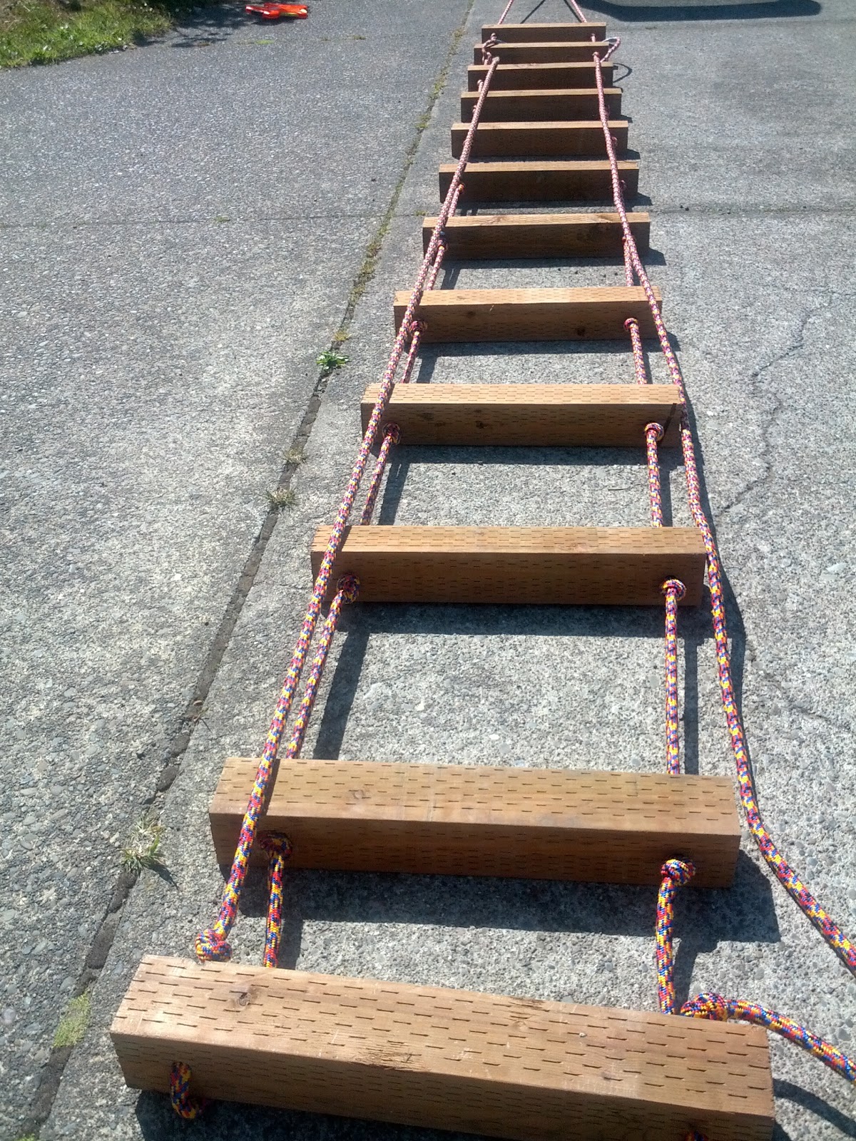 Next, it was simply a matter of threading the rope through each side of ...