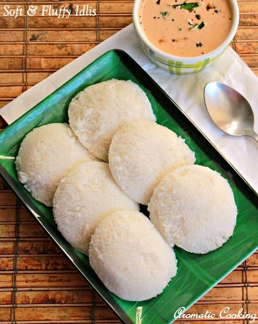 Aromatic Cooking: Soft And Fluffy Idlis ( Steamed Rice Cakes )