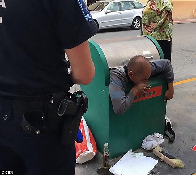 Man gets rescued after climbing inside a waste bin and getting stuck ...