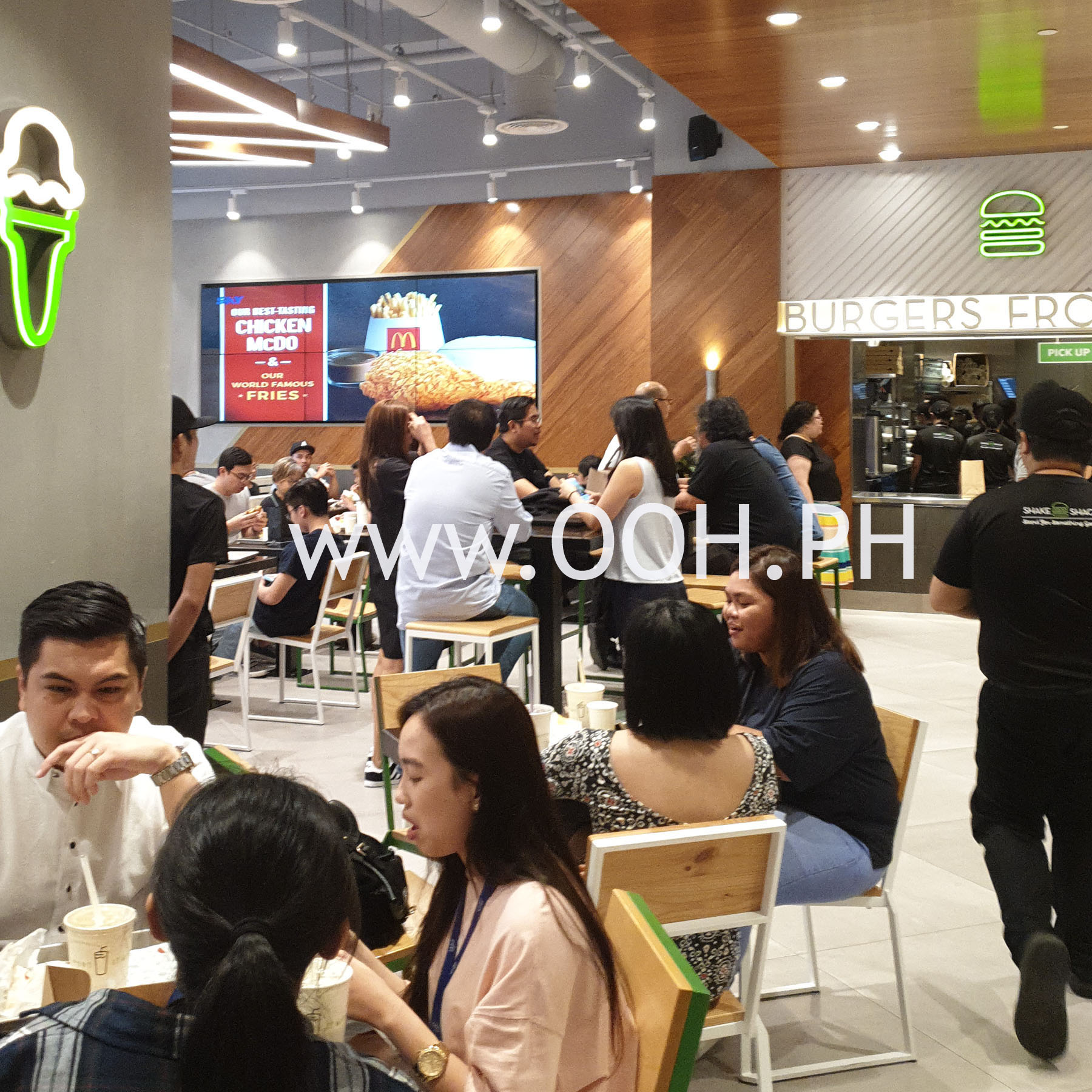 LOOK! : McDonald's Advertisement Appears on Shake Shack's Digital Signage