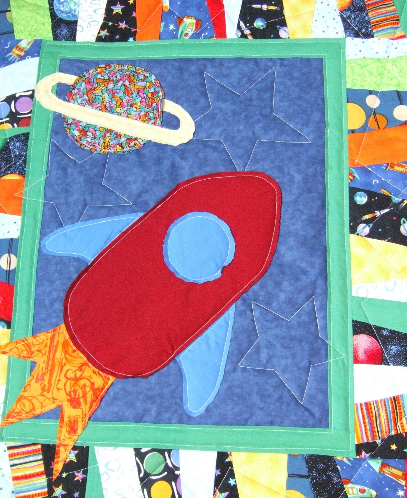 Lilyquilt: Blogger's Quilt Festival: Blast Off! Rocket Ship Baby Quilt