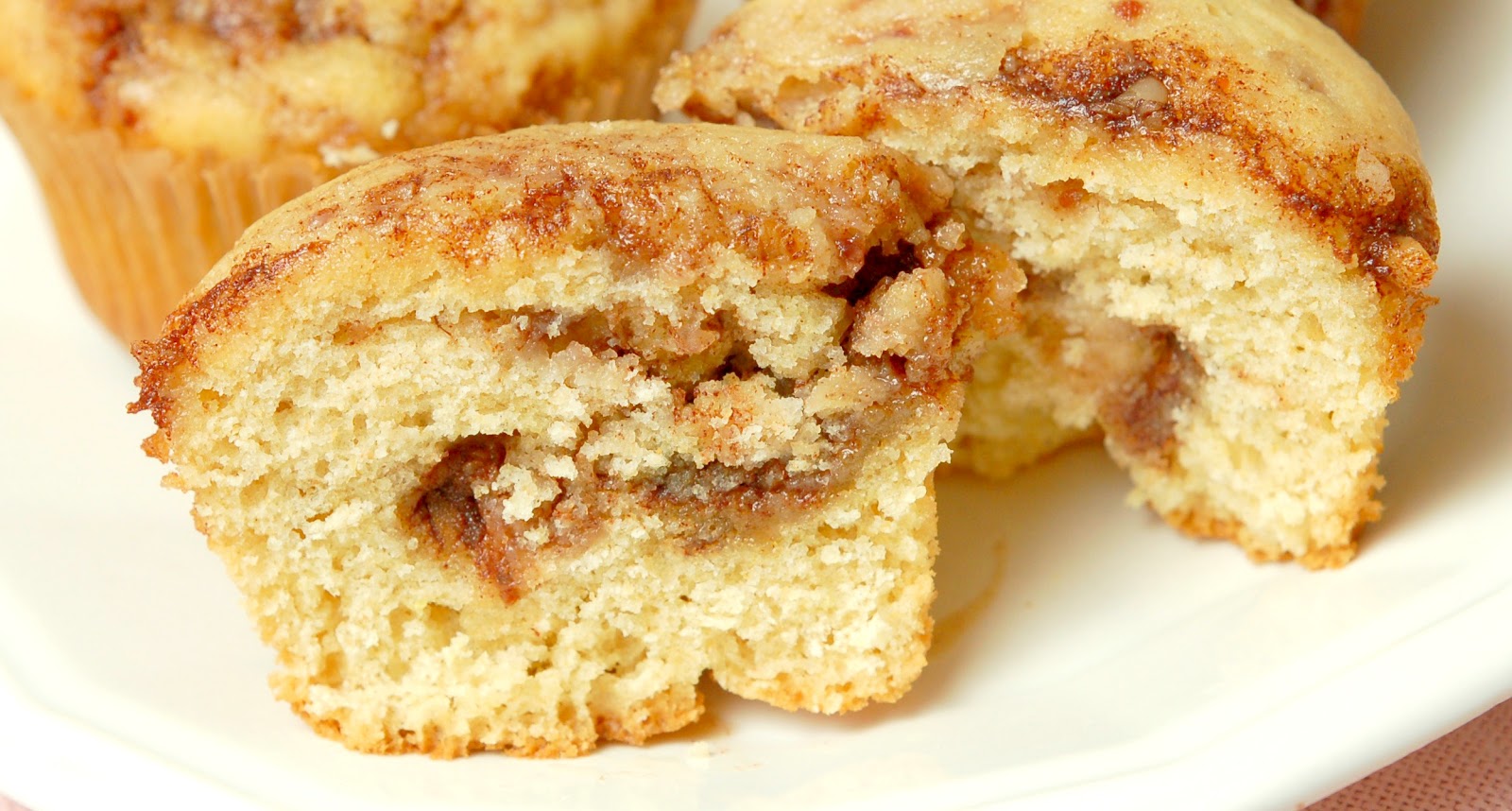 Raspberry and Cinnamon Almond Swirled Muffins - A Kitchen Addiction