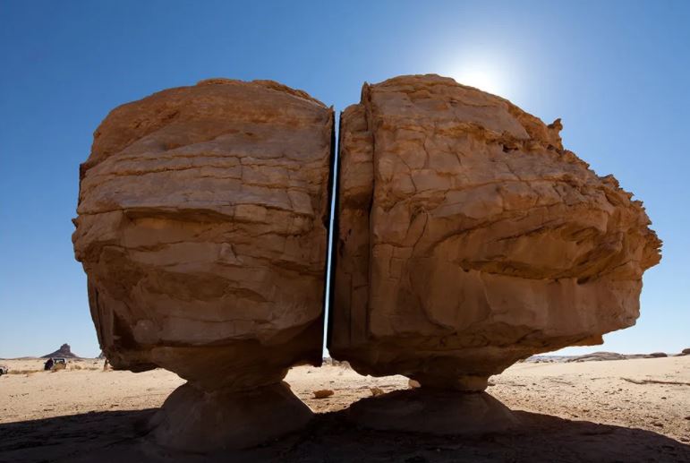 Laser Or Erosion? Mysterious Rock Formation Split Perfectly In Saudi Arabia
