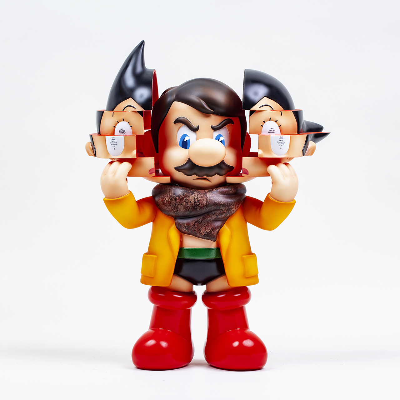 Super Punch: Total Recall x Super Mario x Astro Boy vinyl toy