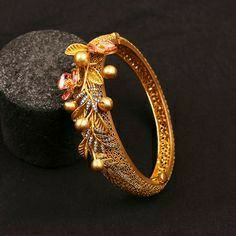 Golden broad bracelets