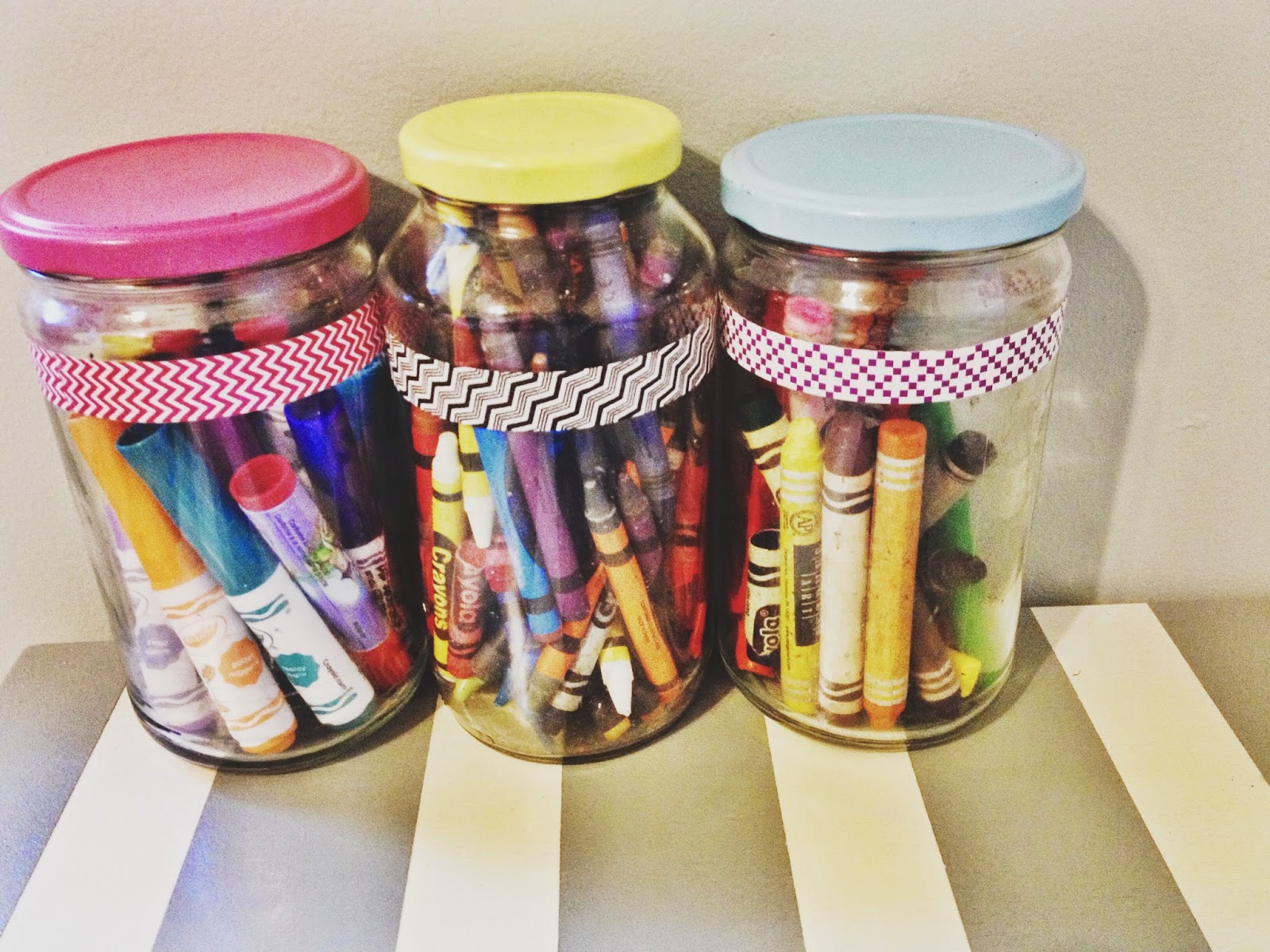 Below the everyday board is above her table and chairs- in order to ...