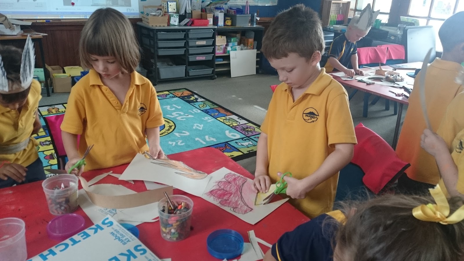 Room 8: Making our animal costumes for assembly.