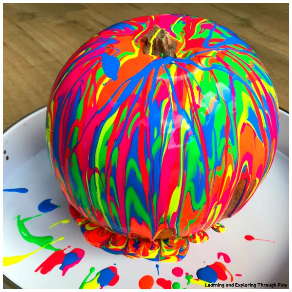 Learning and Exploring Through Play: Carve Free Neon Painted Pumpkins