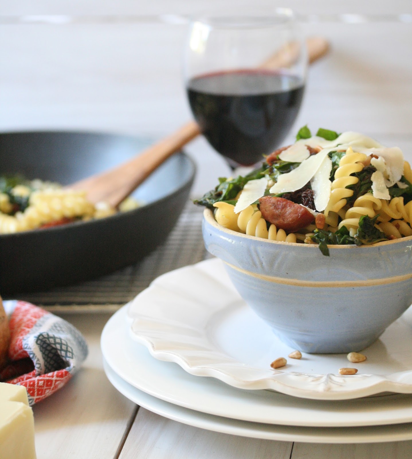 Curly Pasta with Sausage, Swiss Chard, and Pine Nuts