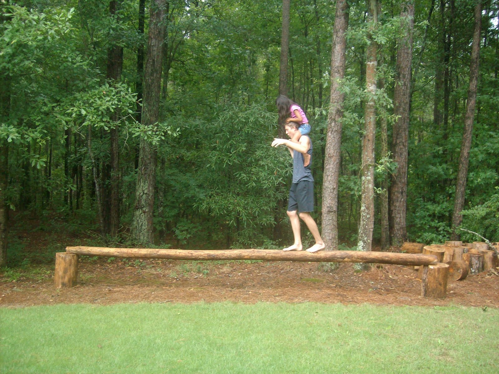 Treasures in Jars...: Drew's homemade balance beam... (check out video)