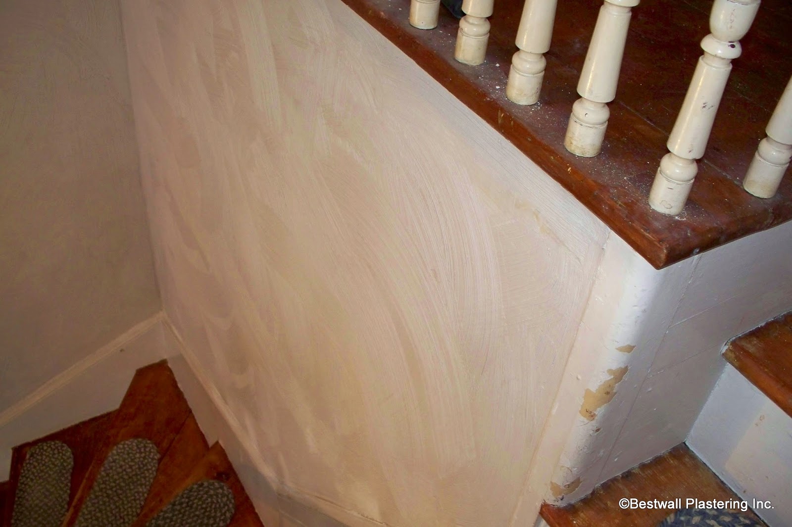 What you need to know about plastering: Textured plaster on staircase