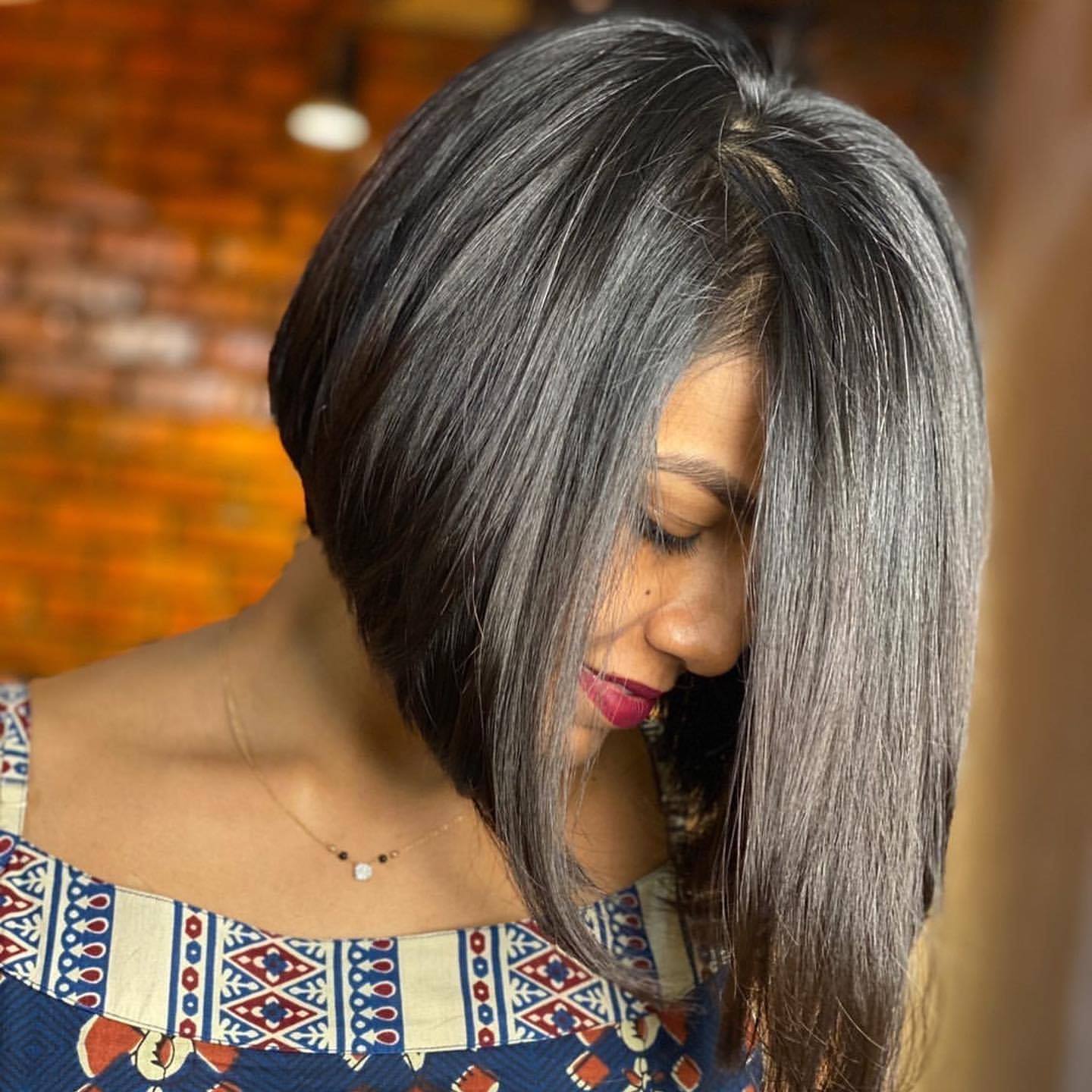 Long to nape length curved bob cut hair style - Village Barber Stories