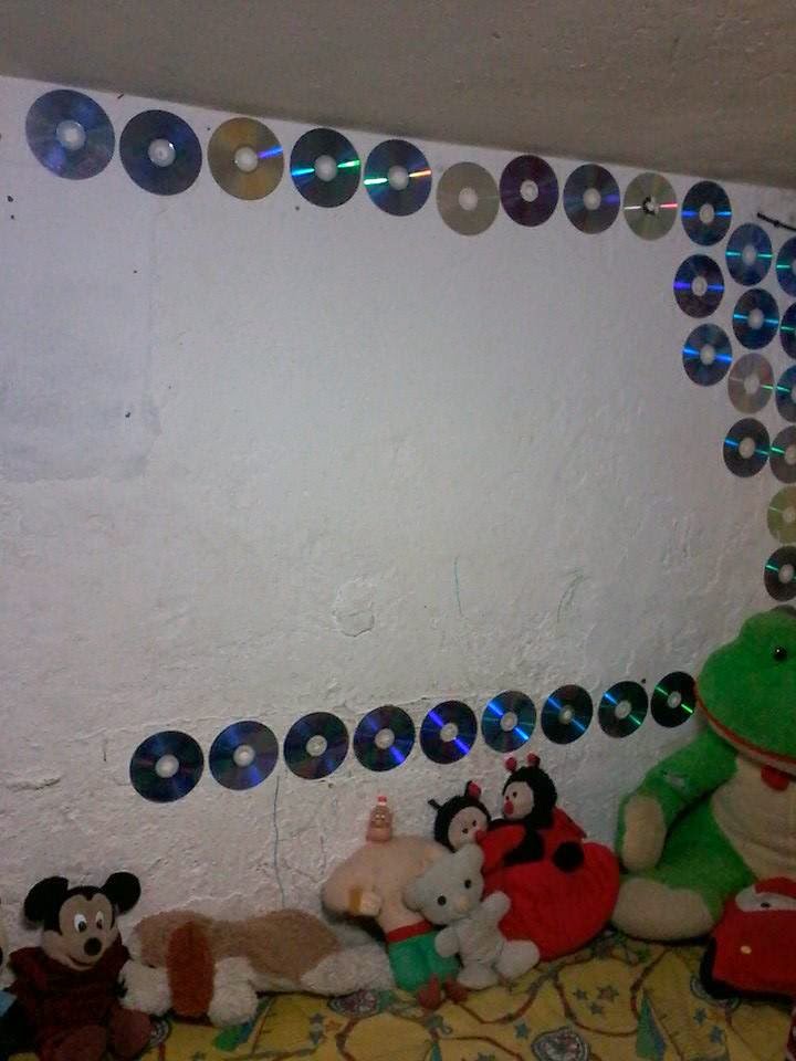 Ideias e Mãos a Obra!!!: Parede decorada com Cds velhos.