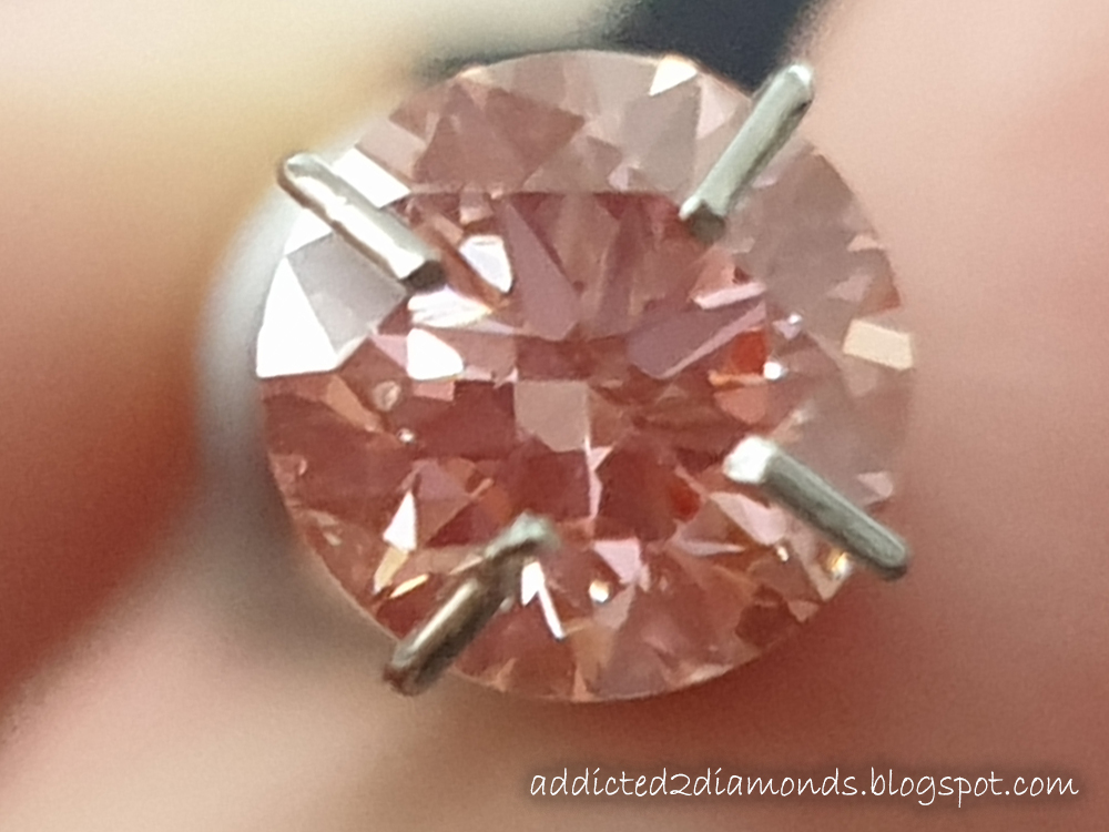 Pink diamond with Strong Blue Fluorescence - how come the color looks ...