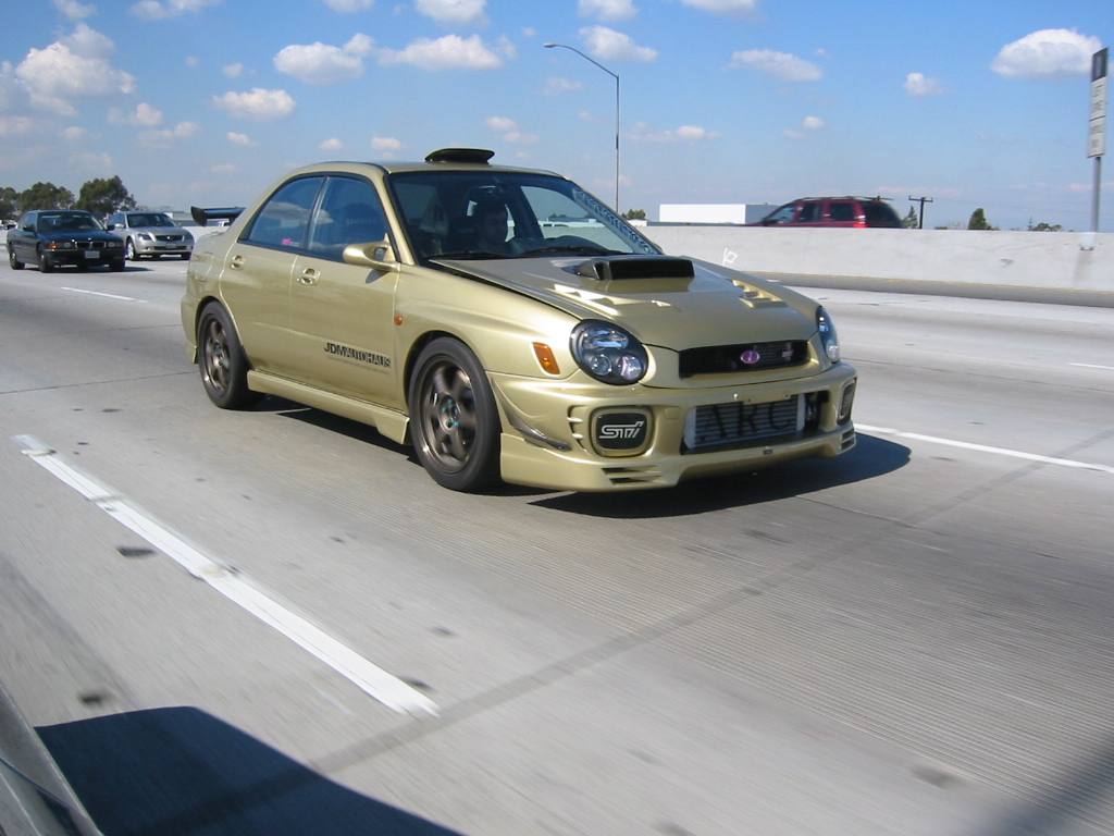 RESPECT Volk Racing: Gold bug eye WRX on bronze TE-37s