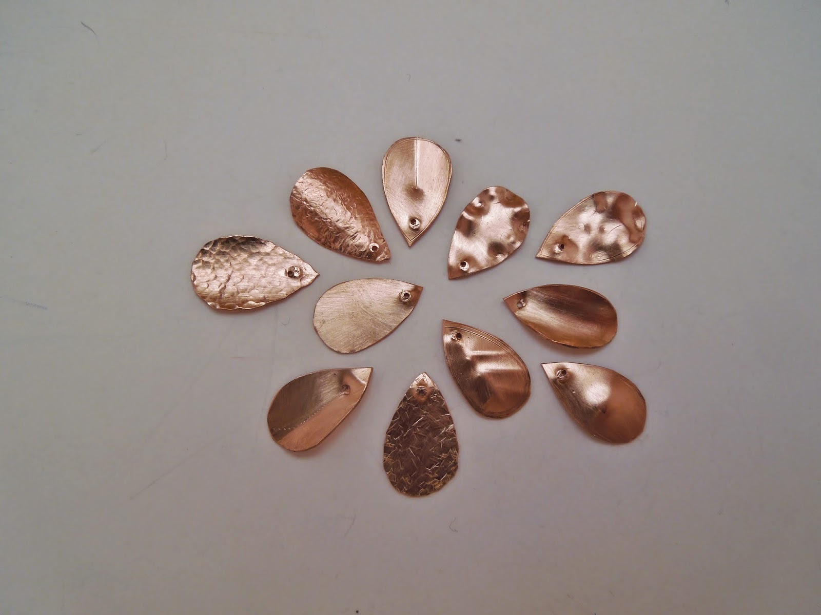 Textured pear shaped metal sheet
