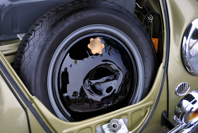 Just A Car Guy: Spare tire portable gas tank? Or the tool set ... found ...