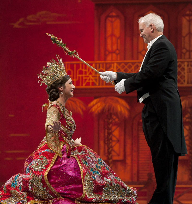 each year a Rose Queen is crowned and members of her royal court dress ...