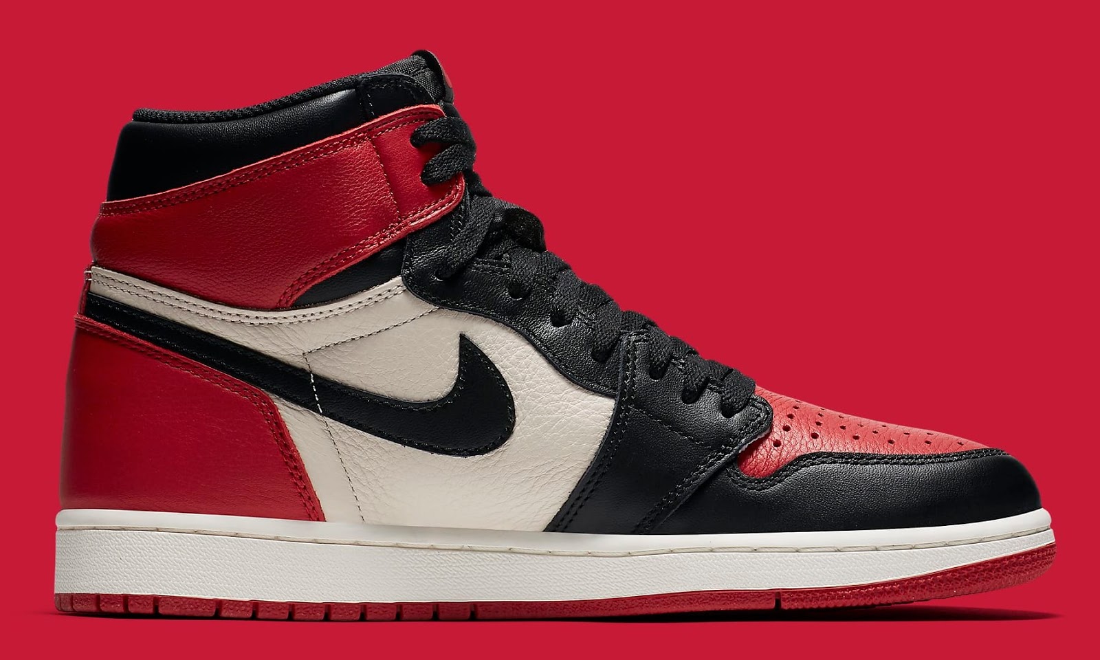A Detailed Look at 'Bred Toe' Air Jordan 1s Releasing on Feb. 24.