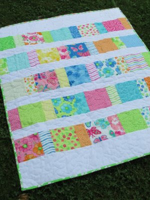 Hanging On by a Needle and Thread: Charm Squares Baby Quilt