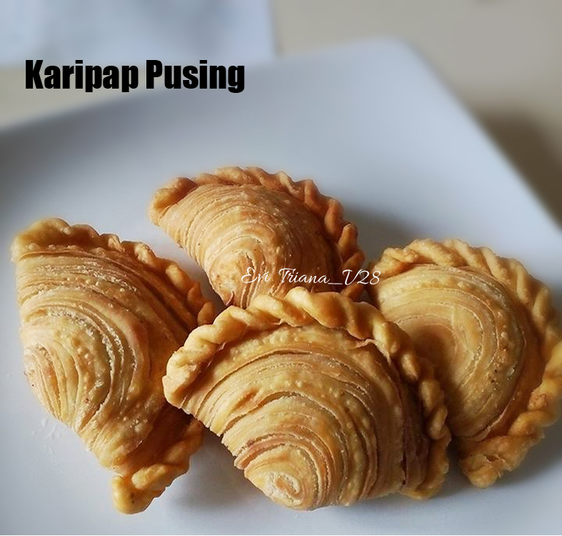 Evi Triana_V28: KARIPAP PUSING
