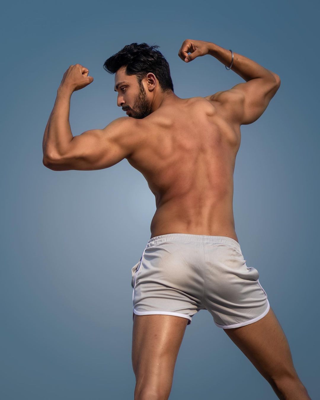 Shirtless Bollywood Men: Hunk in shorts at the beach: Bum bum bole...