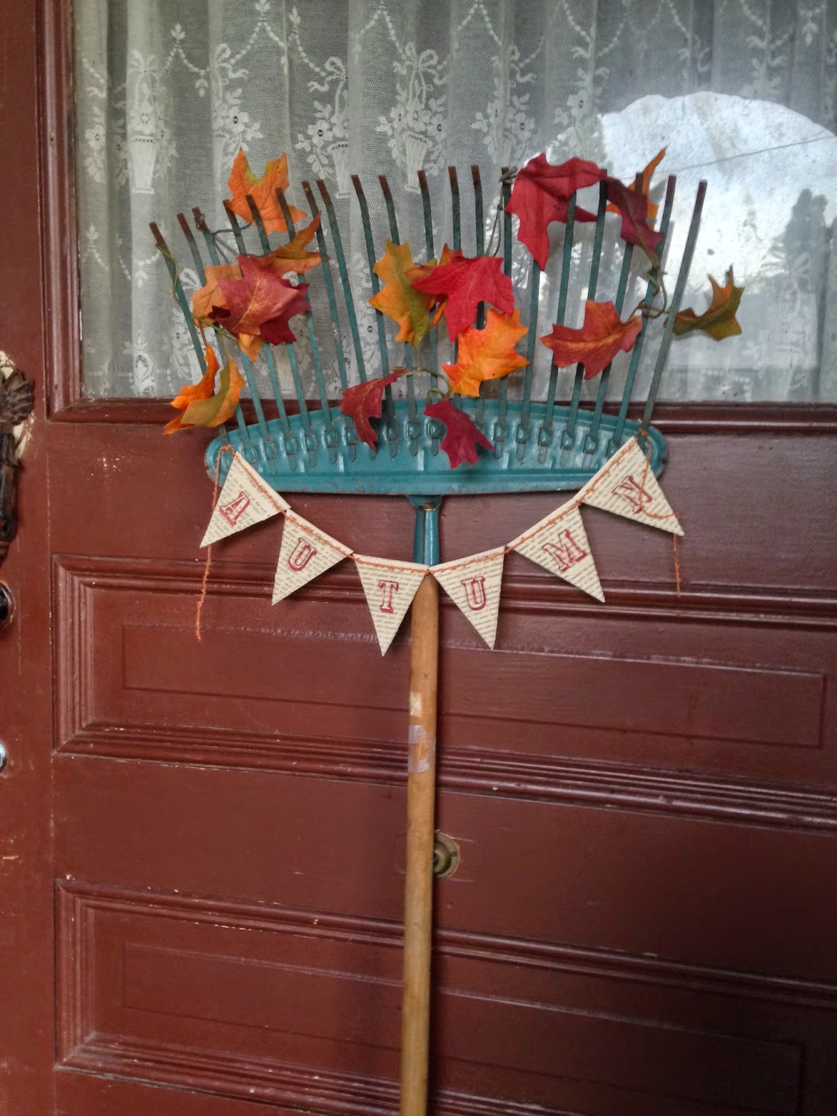 Pollyanna Reinvents: Old Rake Door Decor for Fall