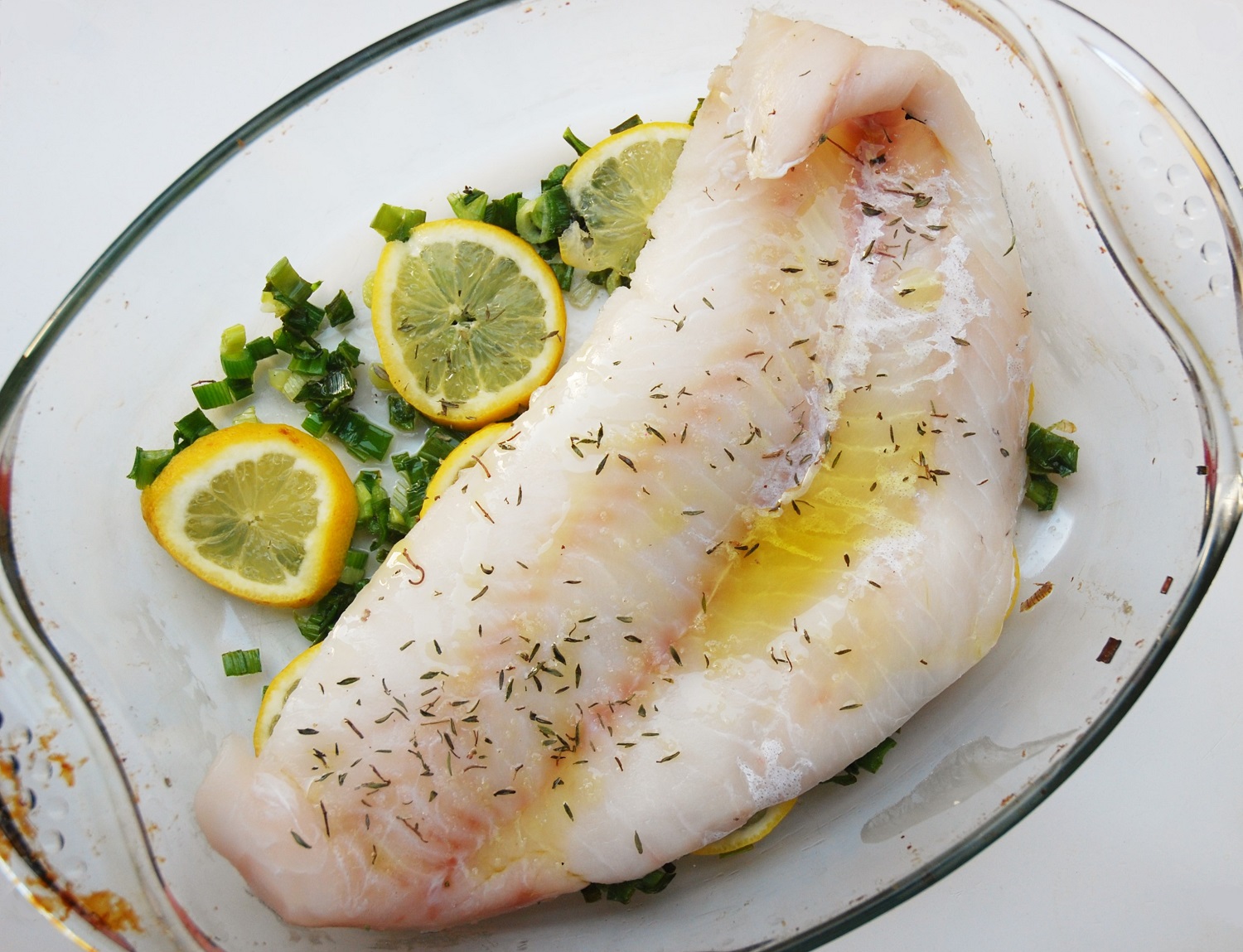 Filet de poisson blanc aux cébettes et citron