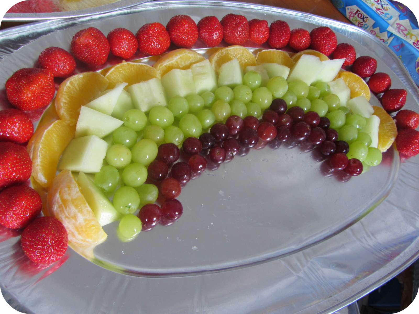 The Adventure of Parenthood: A Rainbow First Birthday Party