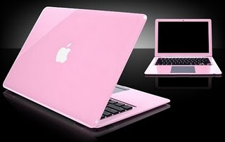 A Super Woman: Pink Apple laptop