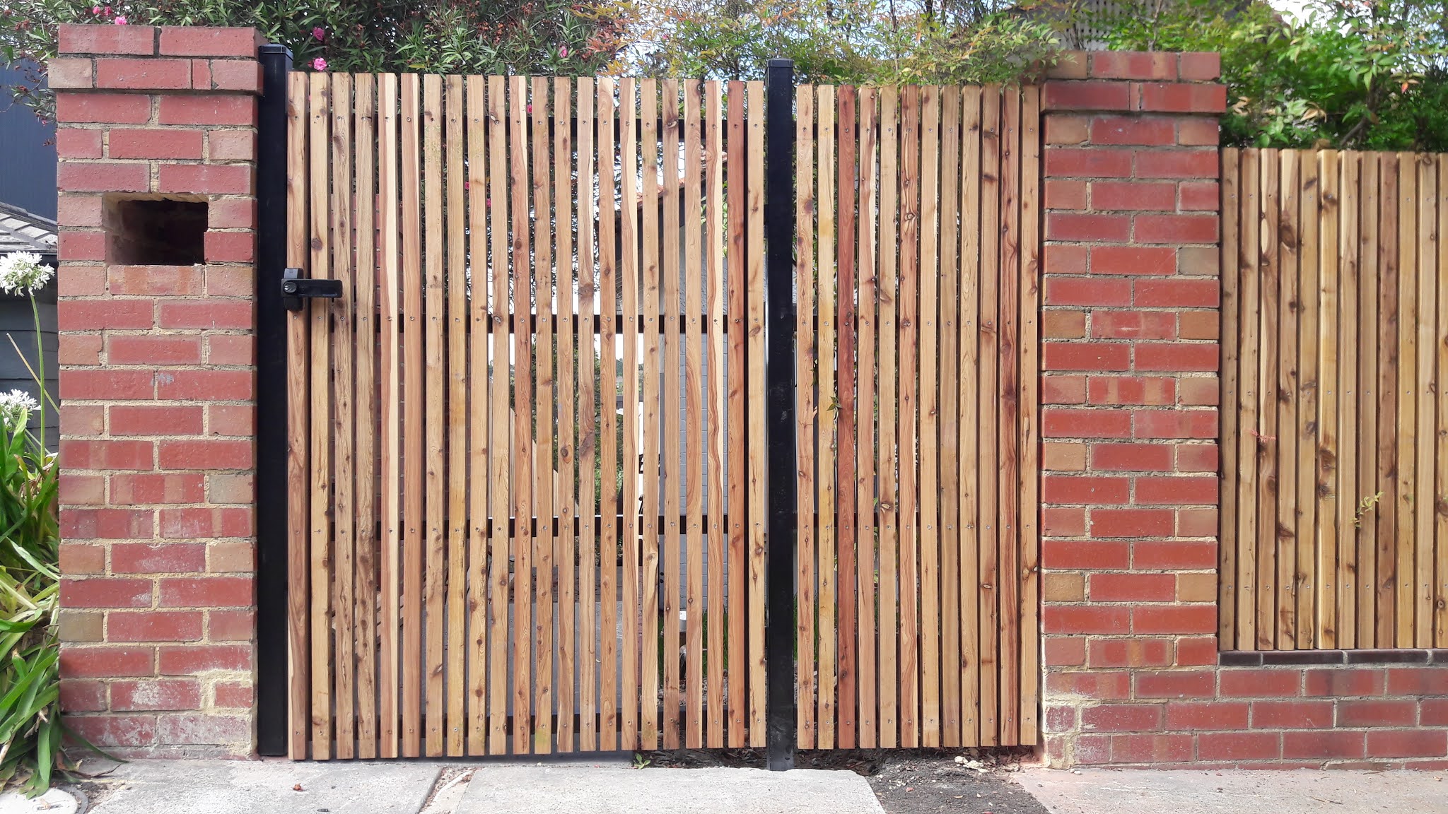 Ironman Fencing: Timber batten fence or gates on Steel frame