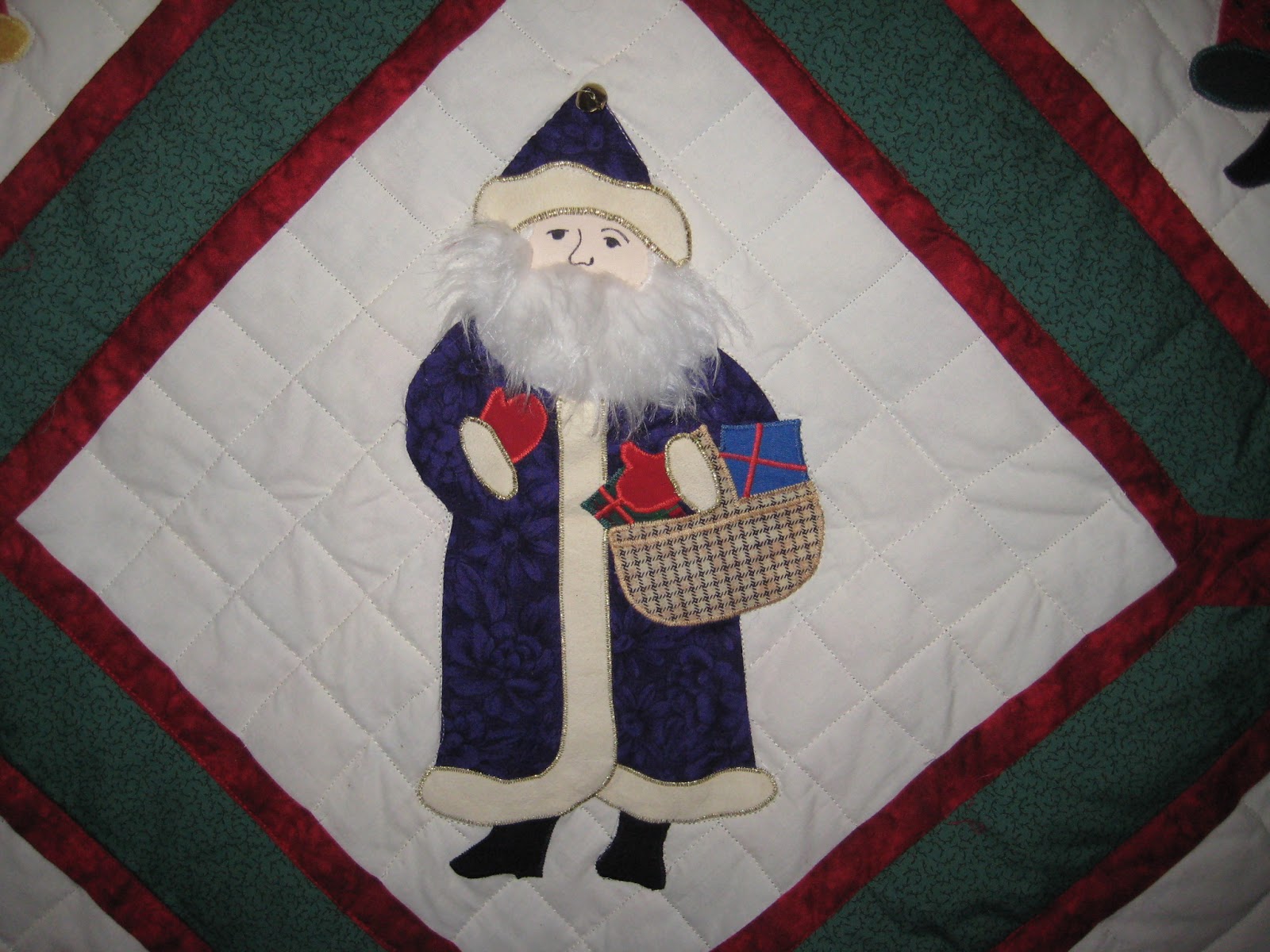 Threads on the floor: Santa Quilt