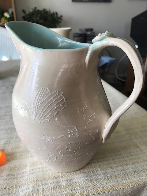 Alchemy of Clay: White on white decorative pitcher designs
