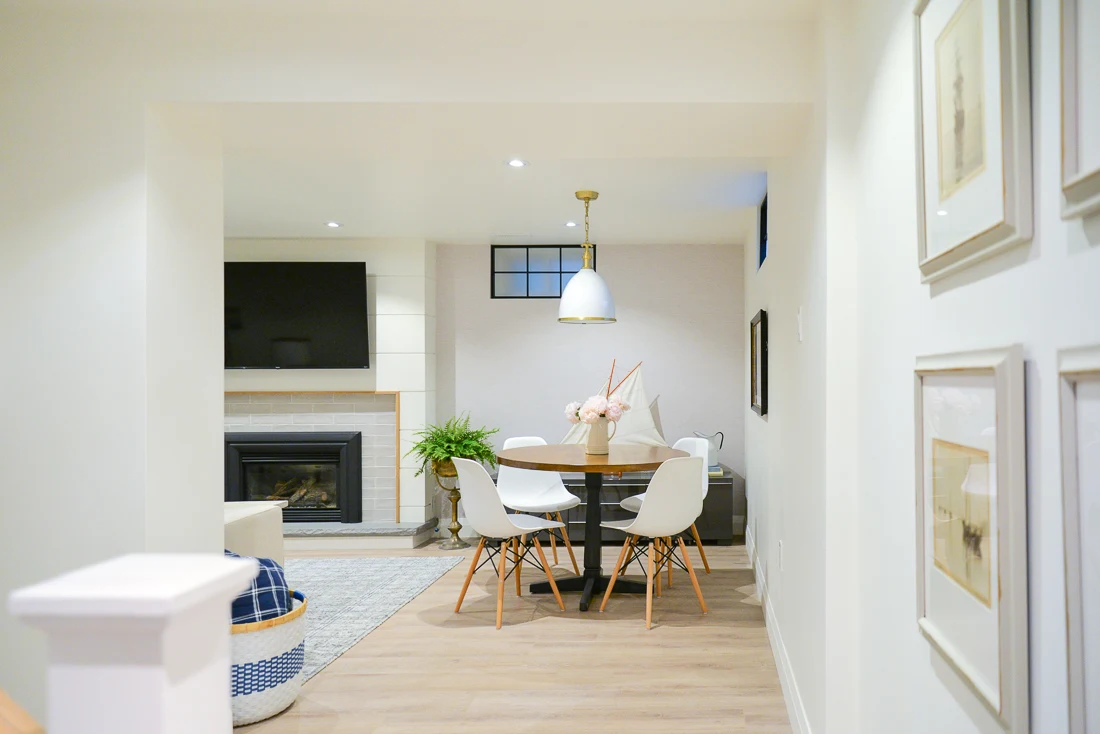 A Bright and Neutral Basement One Year Later - Rambling Renovators