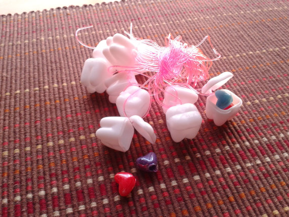 The HoarderRehab Blog: The Destiny of Things: Plastic Tooth Locket to ...