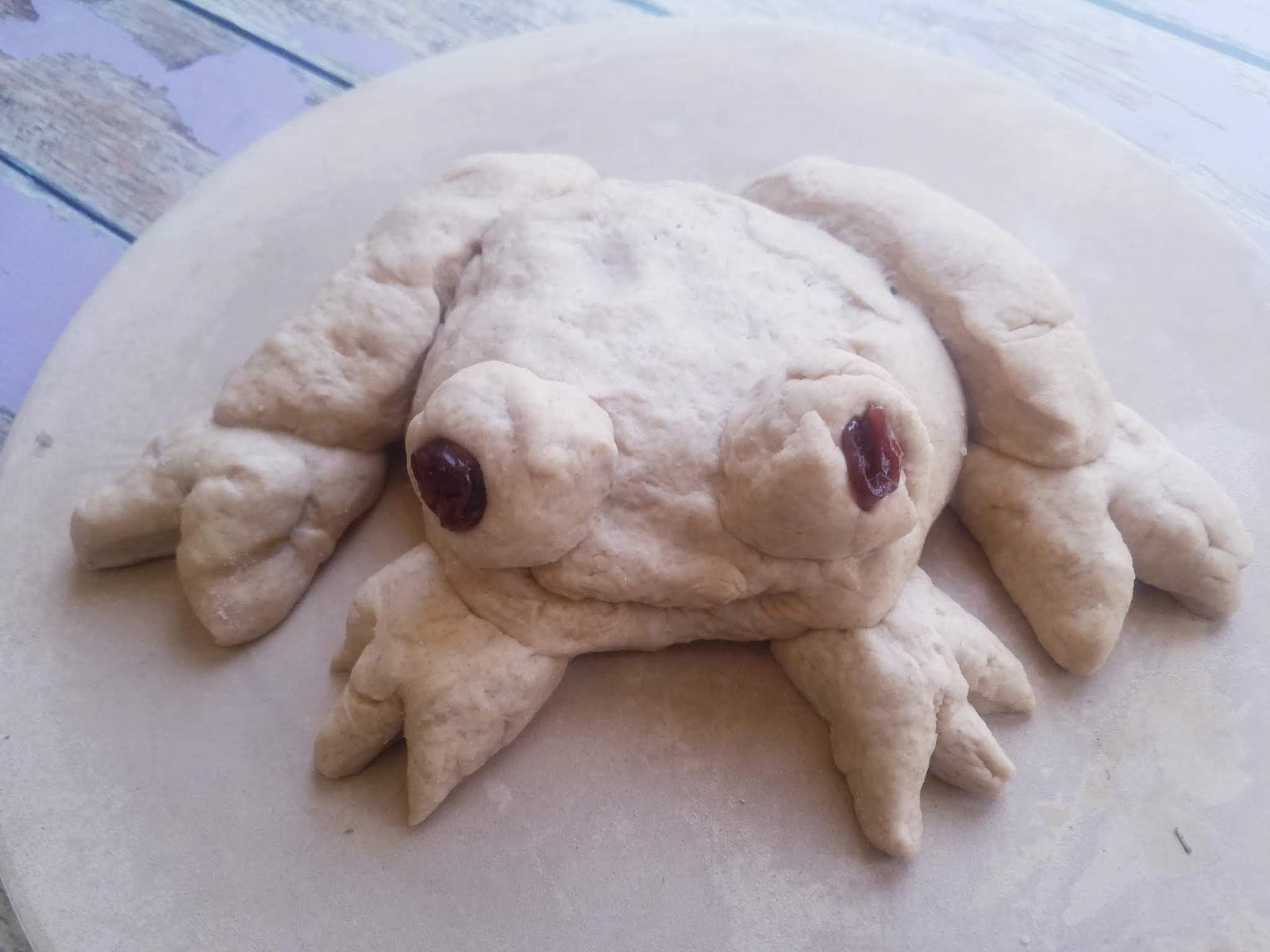 Shaping the bread into a frog and turtle