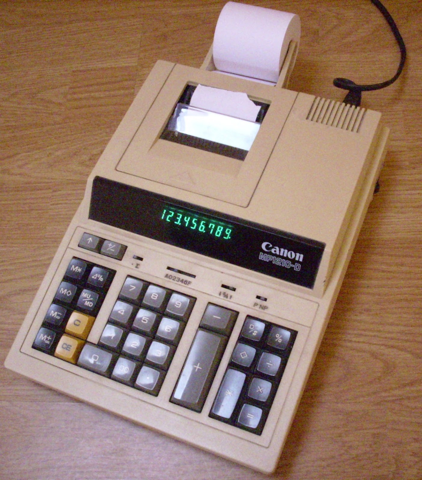 3,1416....DAMICALC: CANON MP1210-D