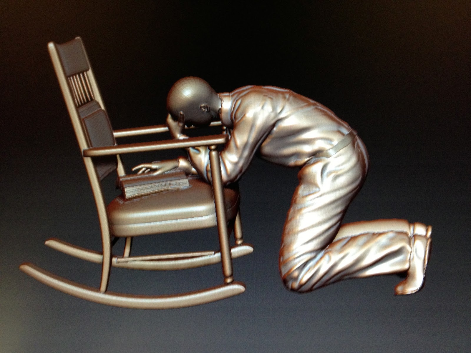 Praying Man Sculpture: Upside down trees and dedication to chairs.