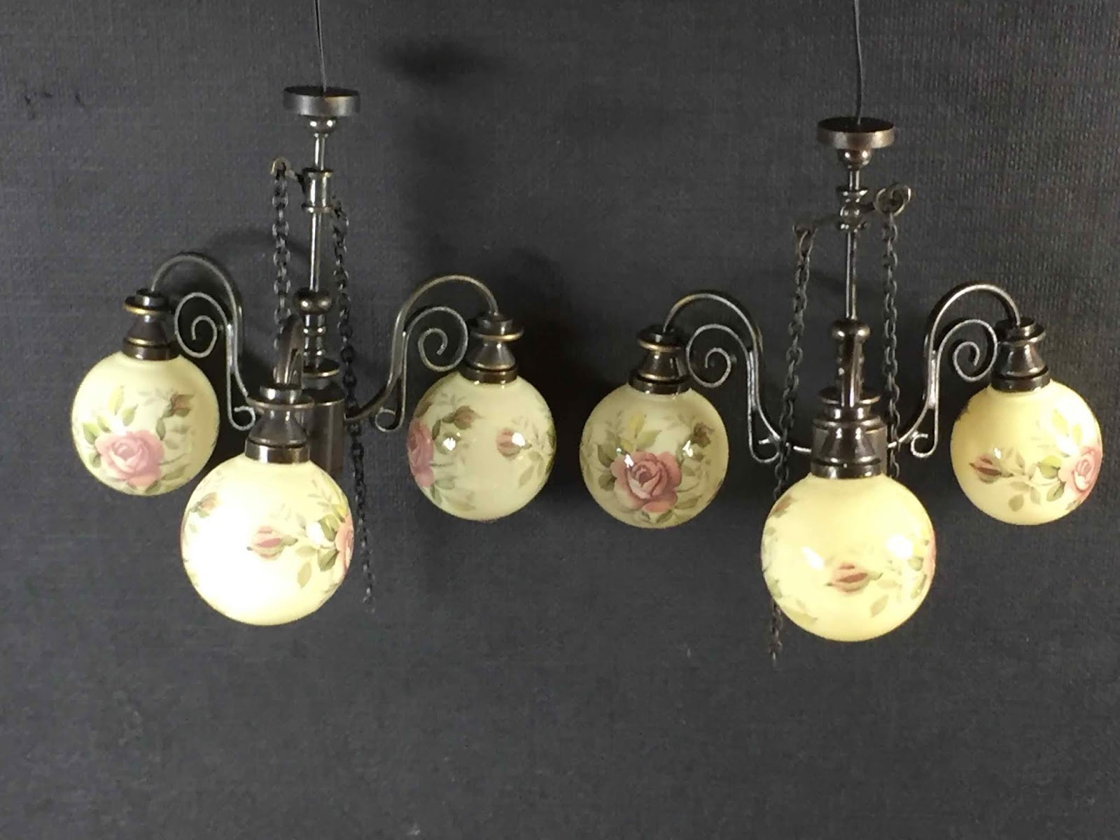 Ray Storey three arm pendant lights