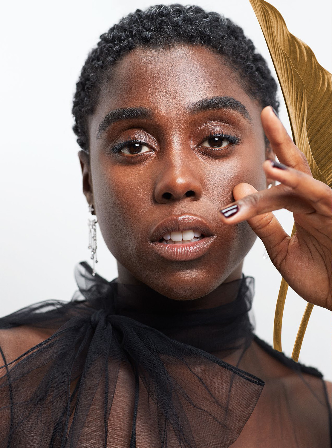 Lashana Lynch in Harper's Bazaar UK December 2020 by Richard Phibbs