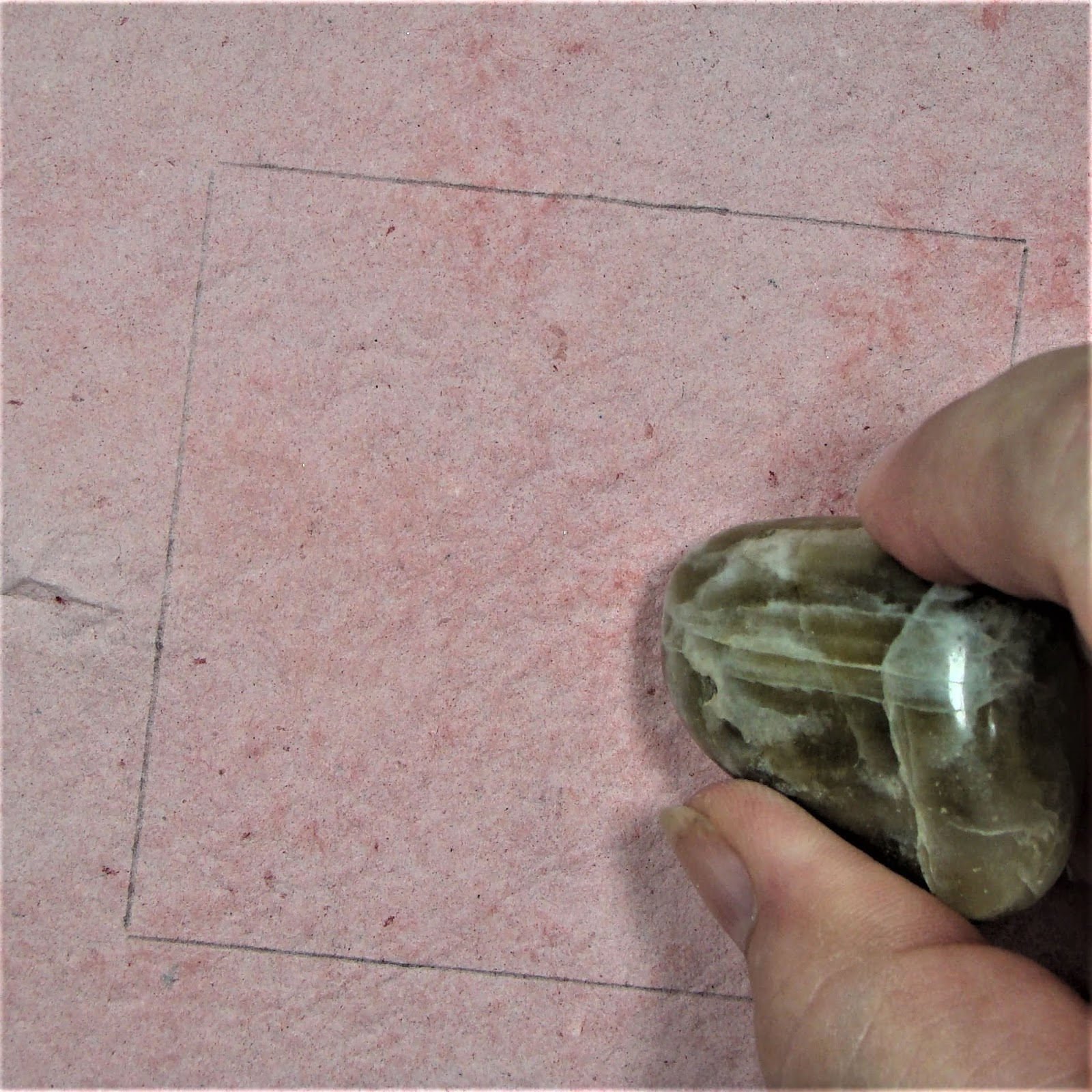 How to polish paper with a stone