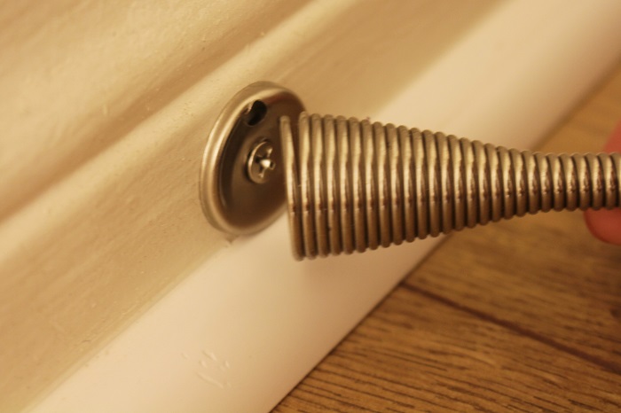 How to Install A Spring Door Stop | It has grown on me!