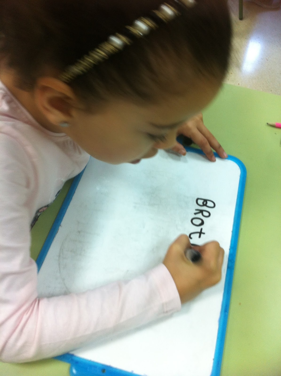 Using our Mini Whiteboards. They Love them!!!