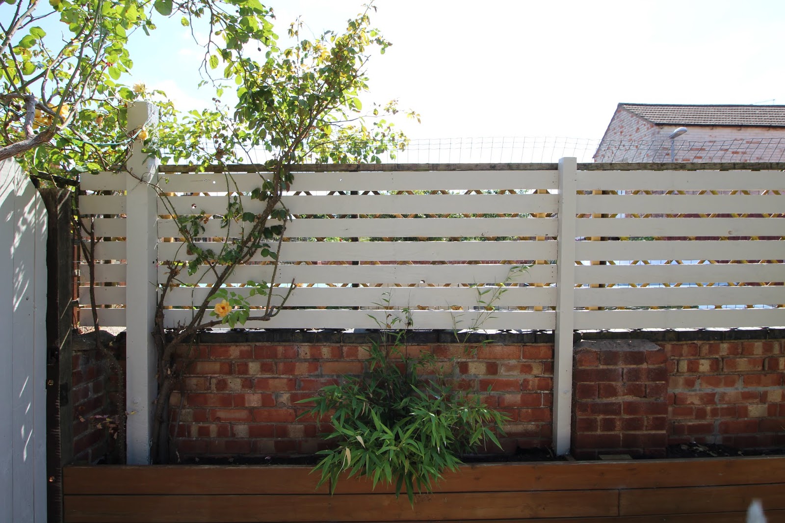 DIY How to Create a Slat Fence with Pallet Wood - Kezzabeth | DIY ...