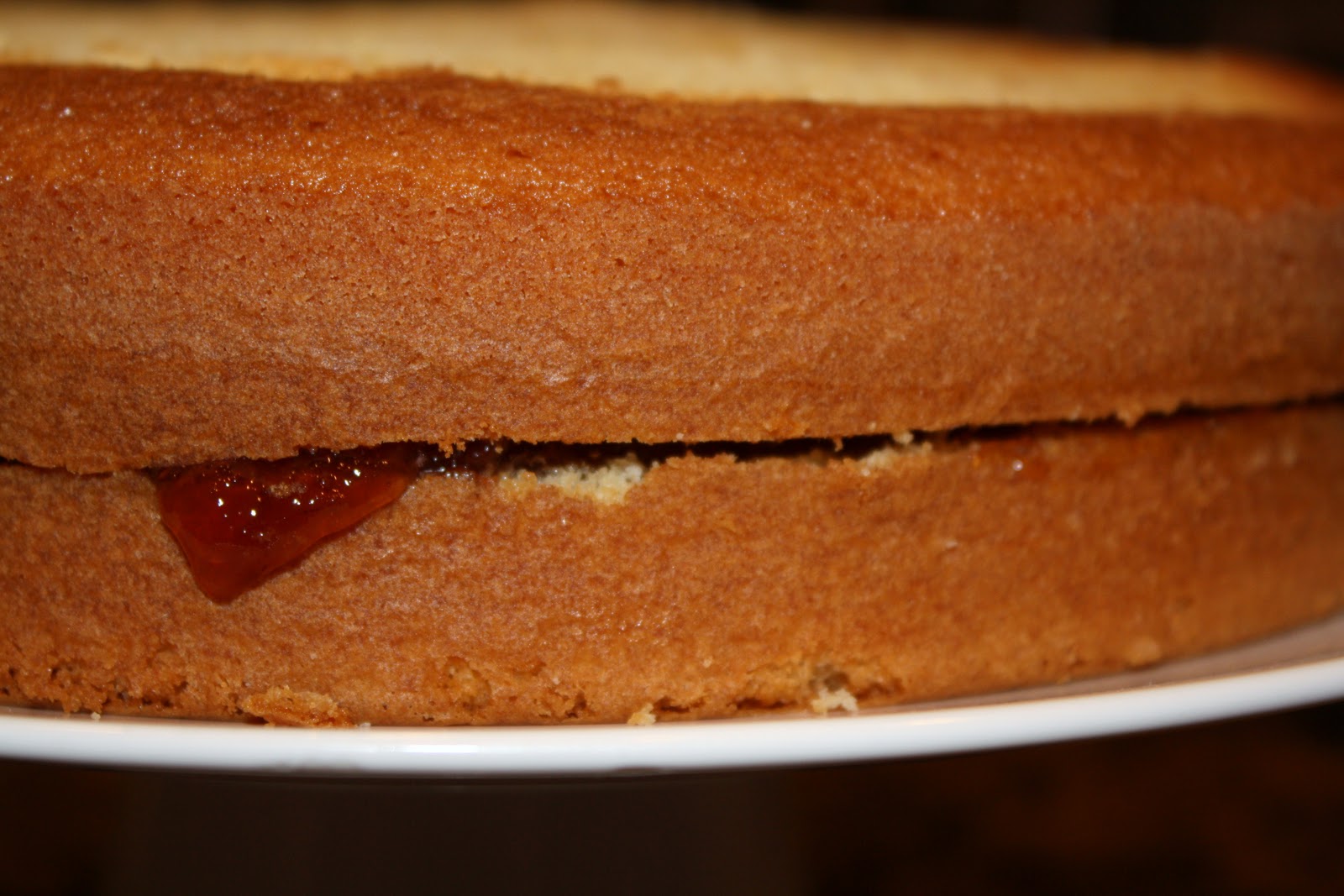 sunday sweets: jam-filled cake with chocolate glaze