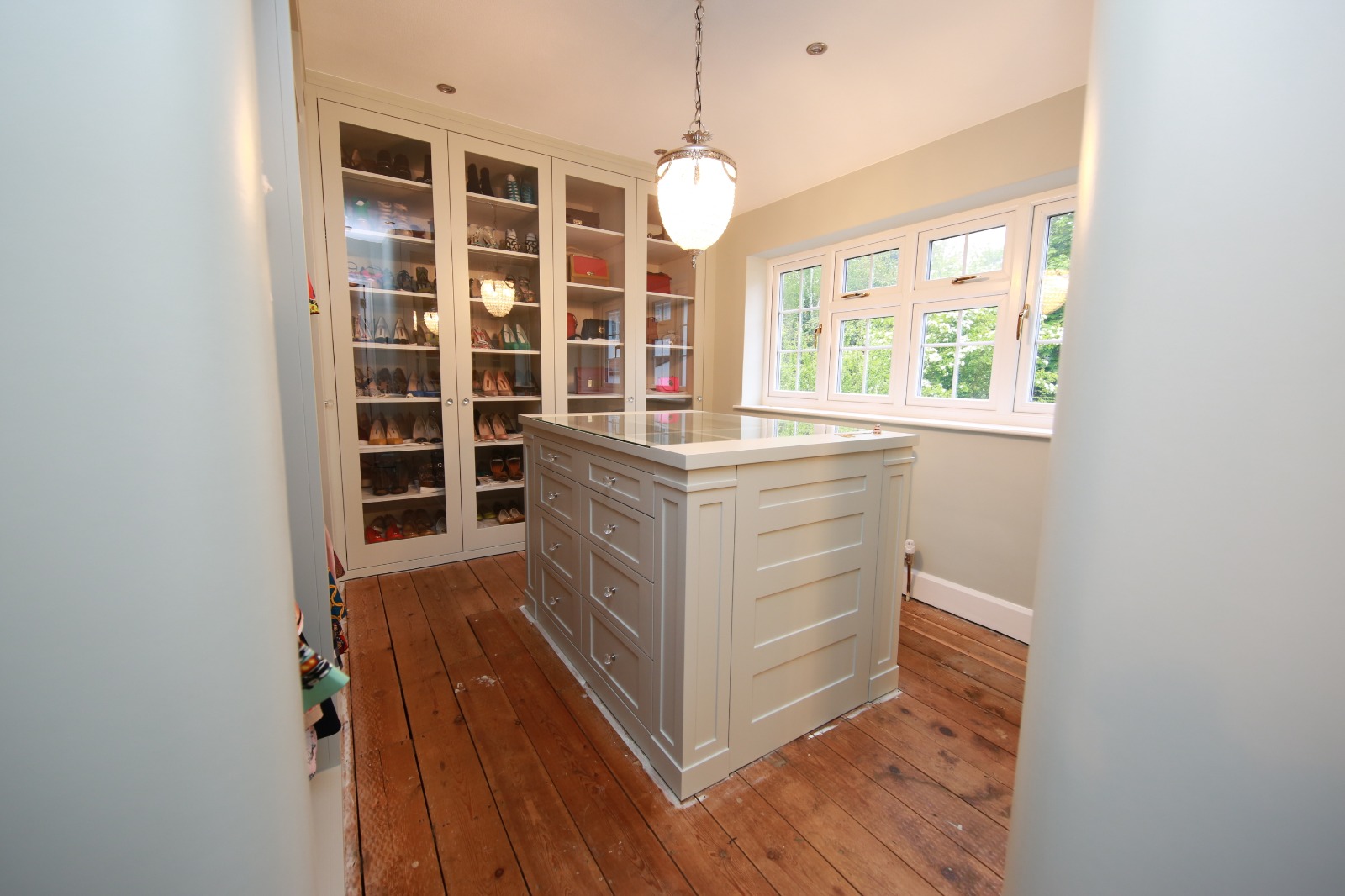 CHIC DRESSING ROOM WITH LOTS OF STORAGE FOR SHOES, BAGS AND JEWELRY