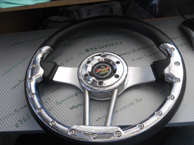 TUNINGCOX: volan sport de culoare crom cu 4 spite metalice la 101lei