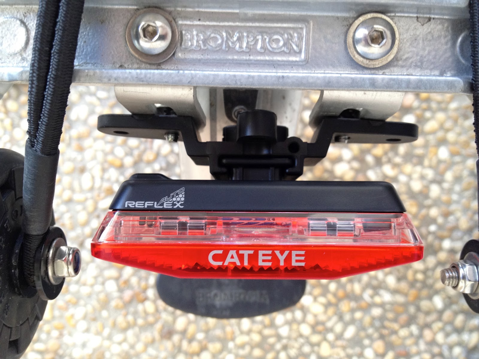 Riding a folding bike around Manila: Cateye Reflex Auto Tail Light